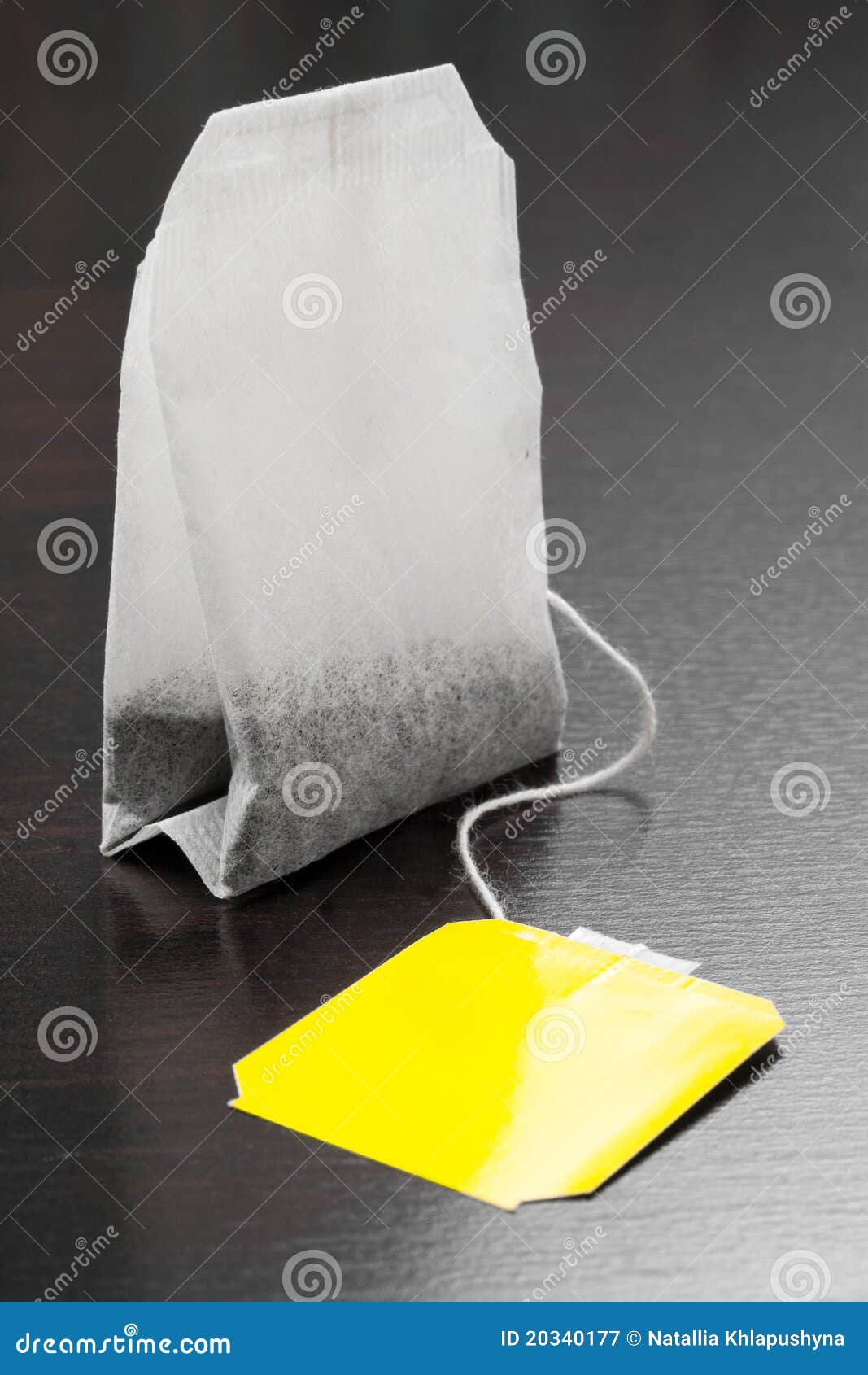 Tea bag with yellow label stock image. Image of teatime - 20340177