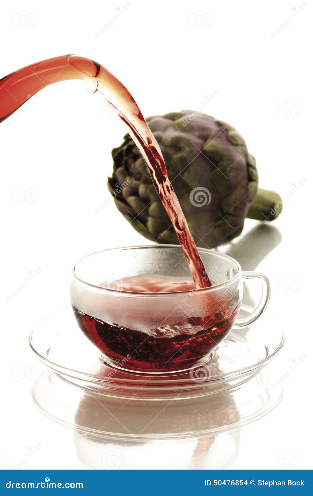Tea Being Poured into Tea Cup, Close-up Stock Photo - Image of ...