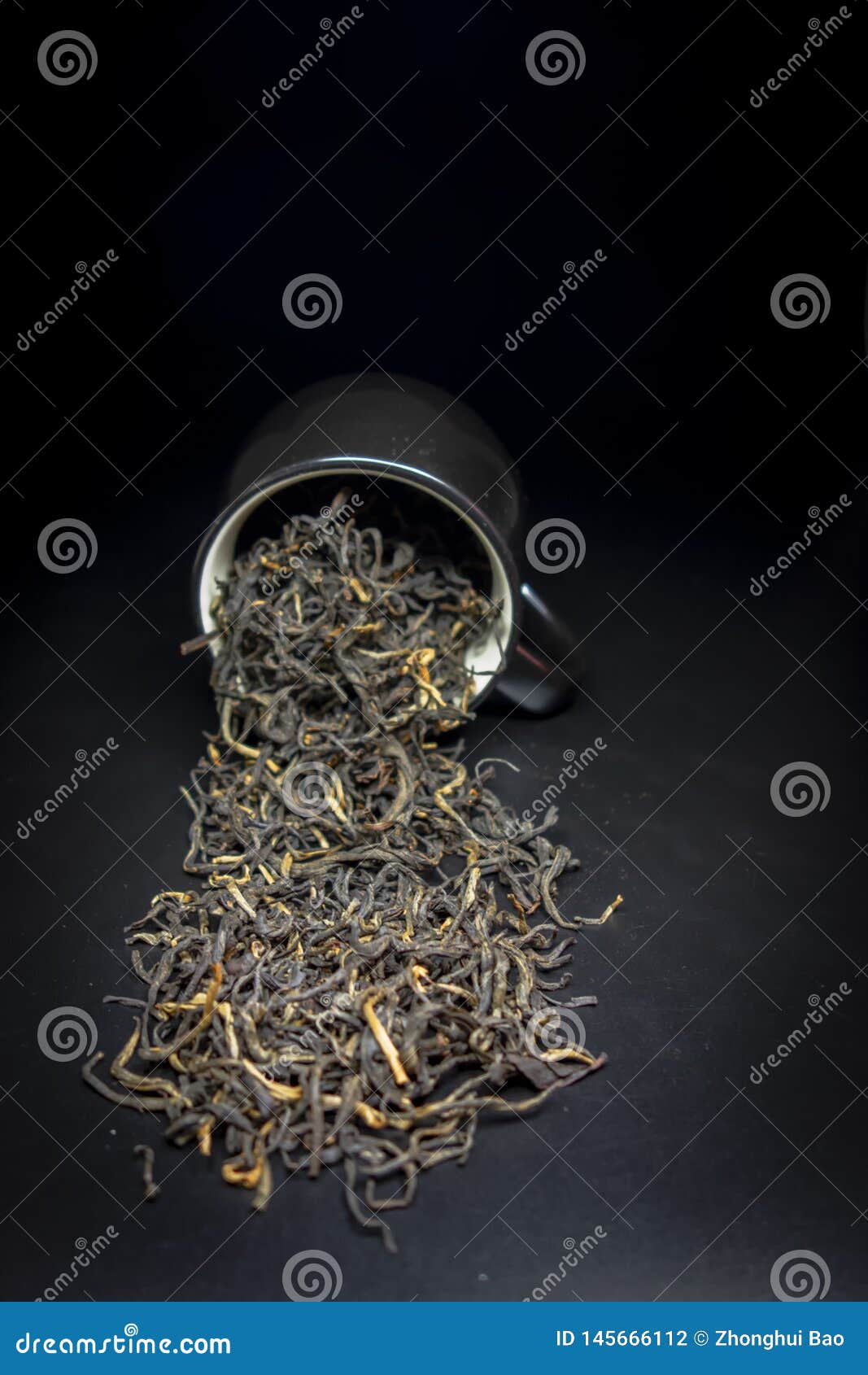 Tea in Black Background stock photo. Image of container - 145666112