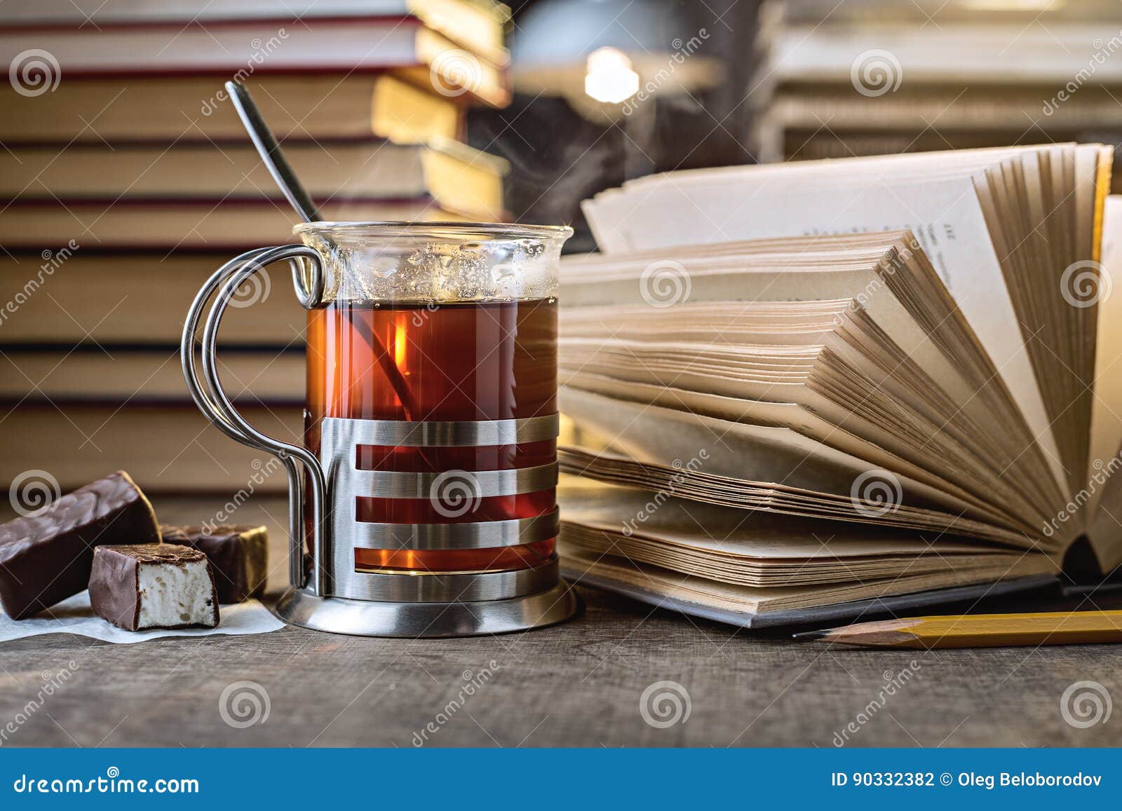 Tea and books. stock photo. Image of steam, glasses, drinks - 90332382