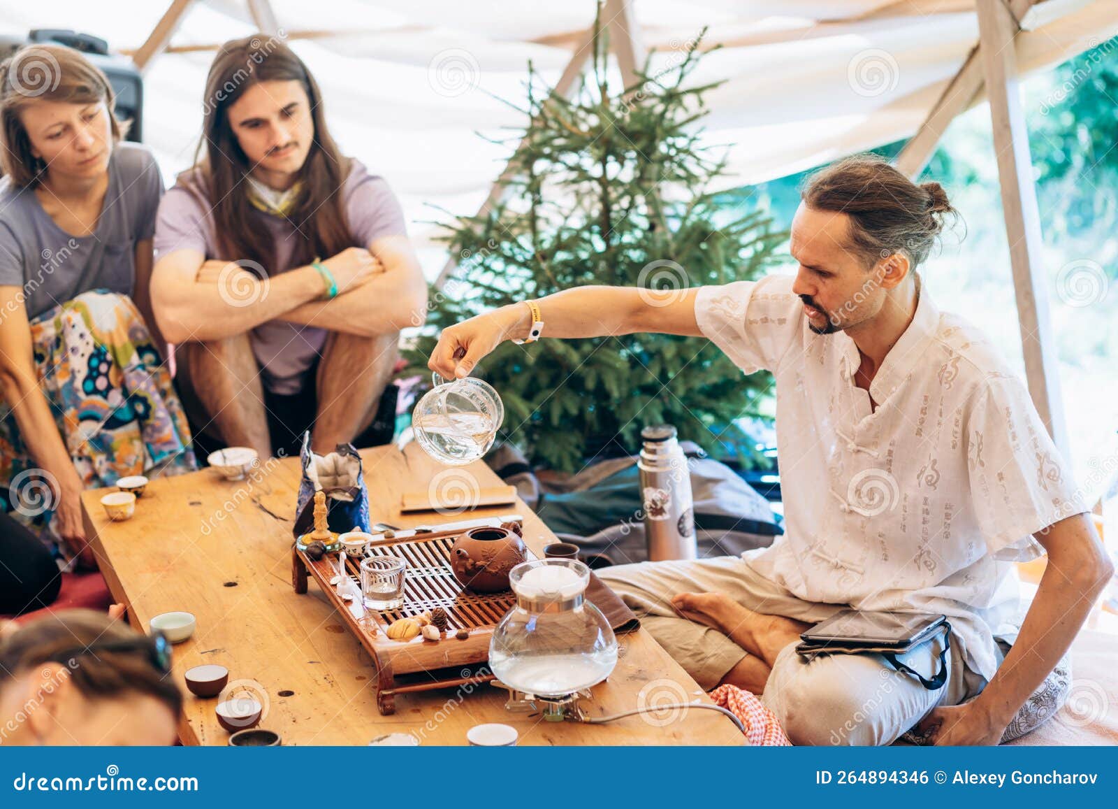 Tea Ceremony. People Sit in a Circle and Taste Tea. Ancient Traditions ...