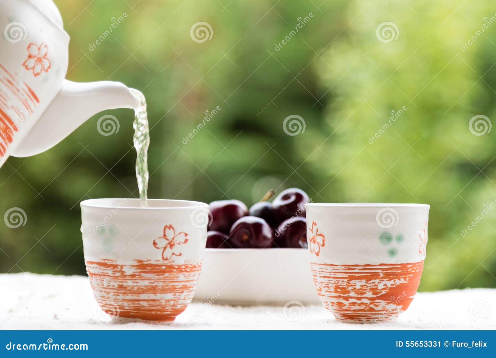 Tea and cherries stock image. Image of fruit, drink, herbal - 55653331