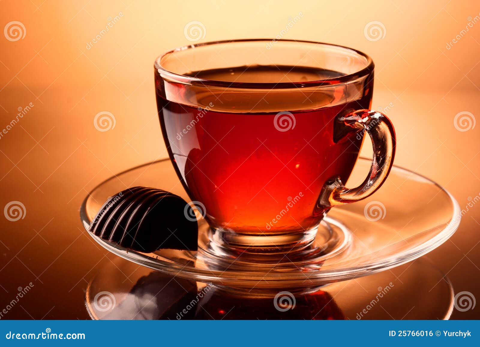 Tea with chocolate candy stock photo. Image of reflection - 25766016