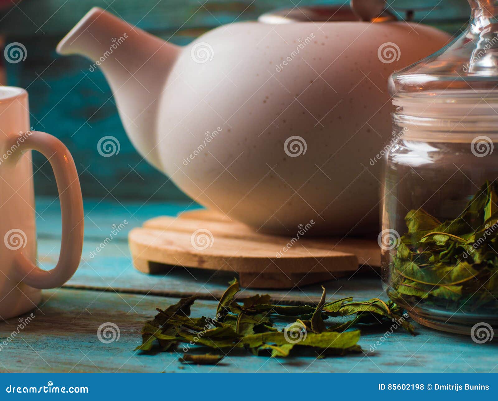 Tea Concept, Cup with Teapot Decorated with Green Leaf Tea Stock Photo ...
