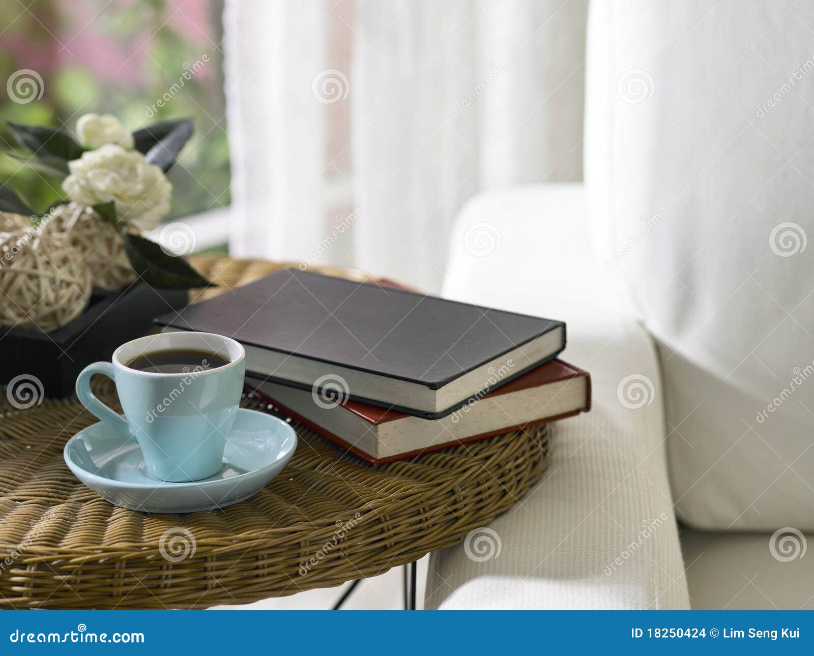 Tea cup and books stock photo. Image of healthy, couch - 18250424