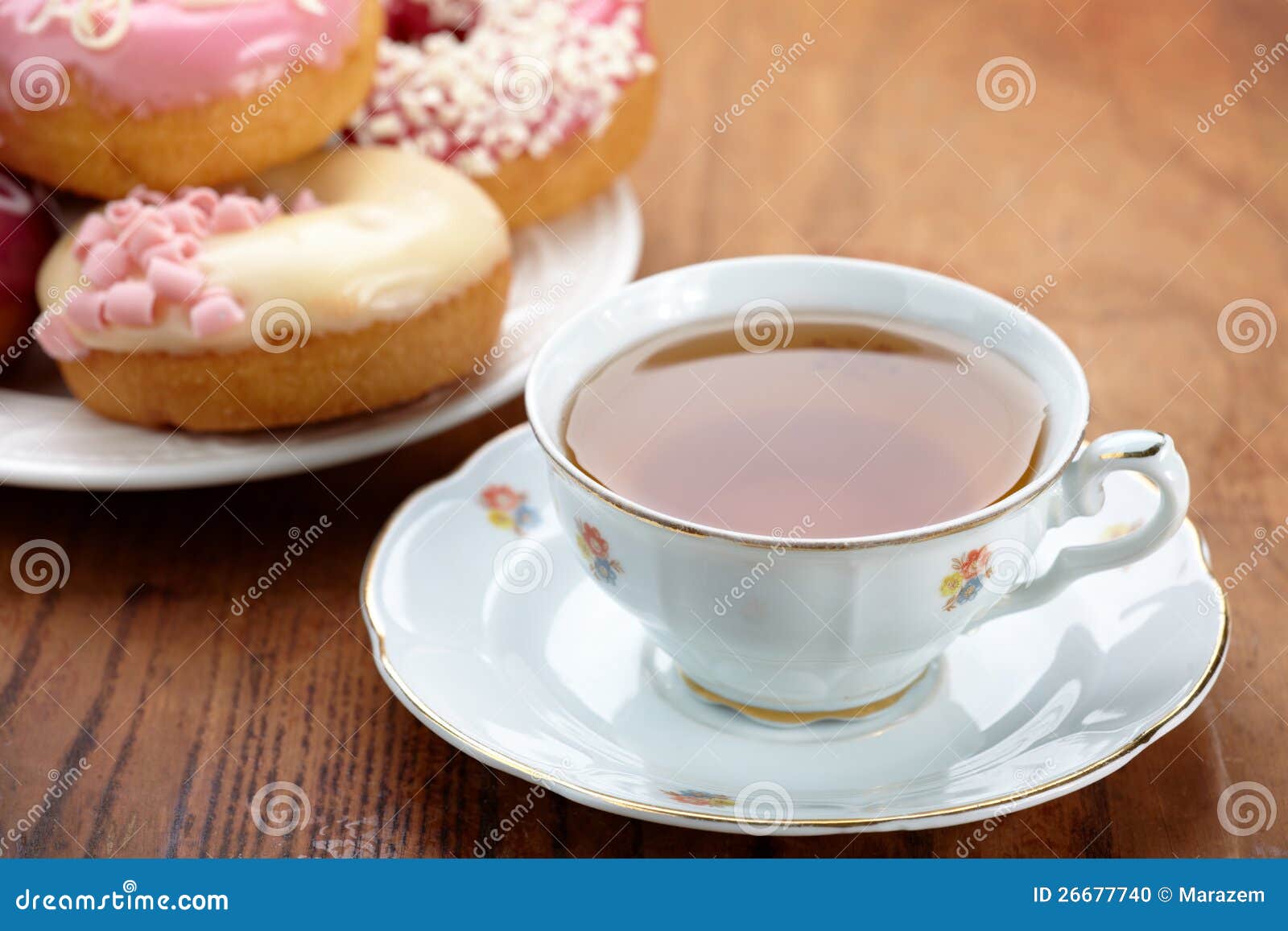 Tea cup and doughnuts stock photo. Image of chine, white - 26677740