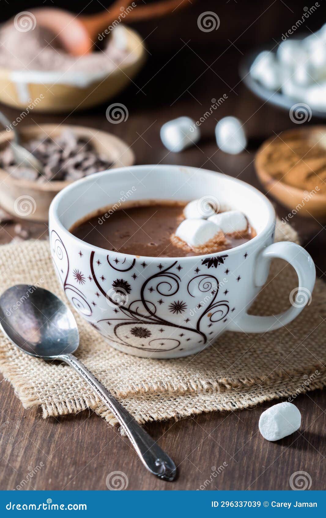 A Tea Cup Filled with Hot Cocoa and Marshmallows with Ingredients in ...