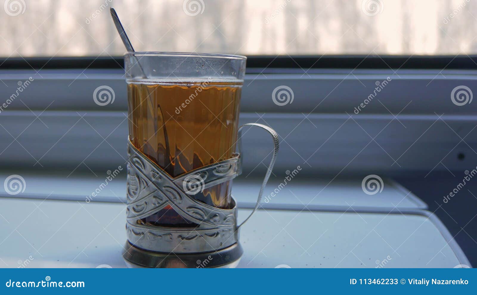 Tea in the Cup Holder is on the Table in the Train Compartment Stock ...