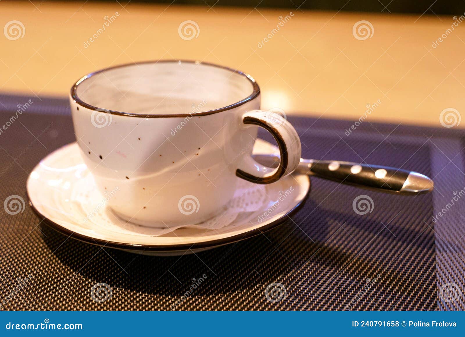 Tea Cup on a Saucer with a Teaspoon on the Table Stock Photo - Image of ...