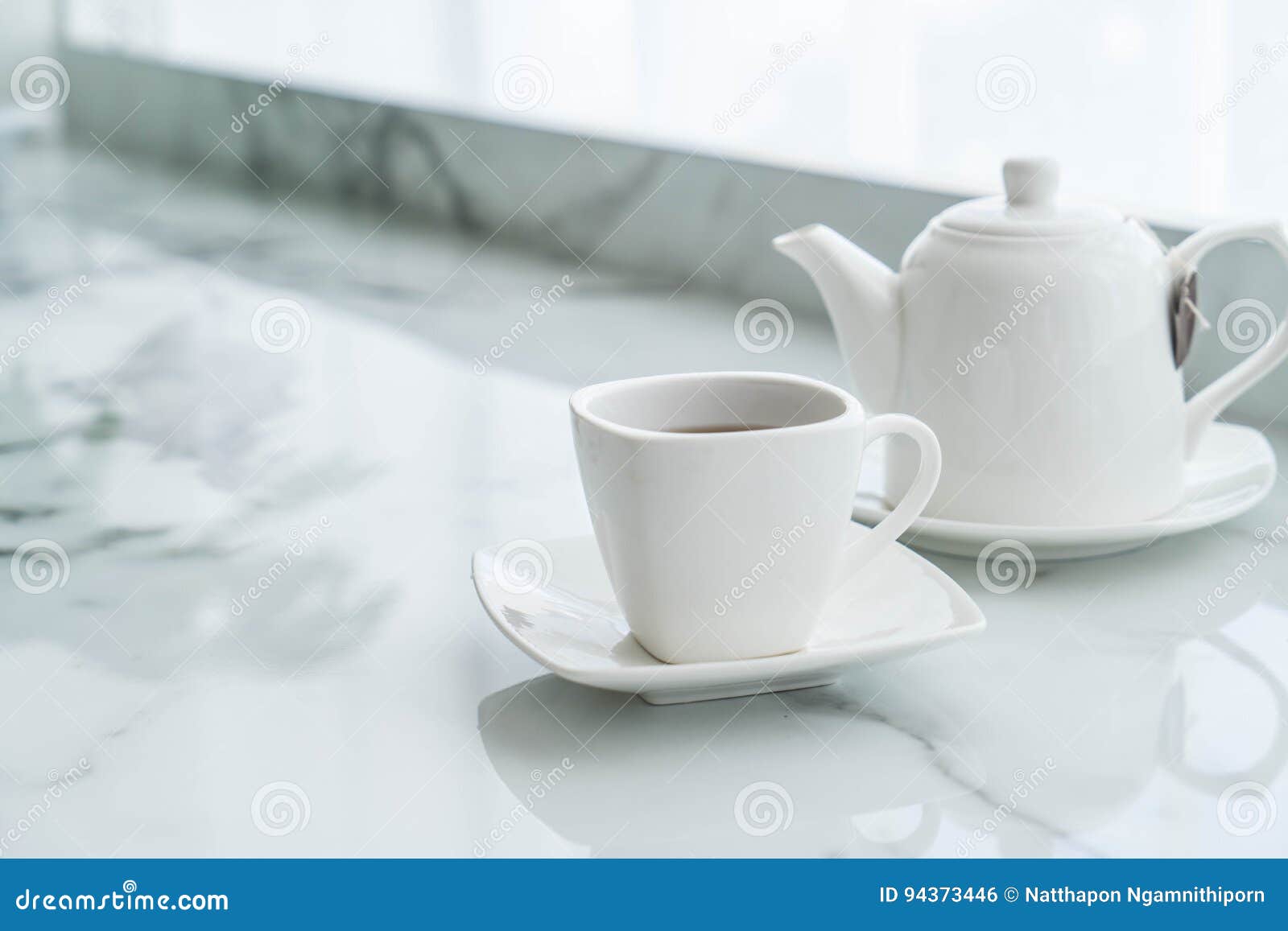 Tea cup on the table stock photo. Image of beverage, table - 94373446