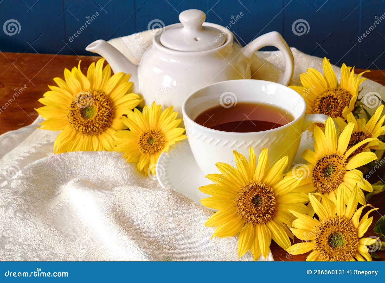 Sunflowers and Tea stock image. Image of blossom, white - 286560131