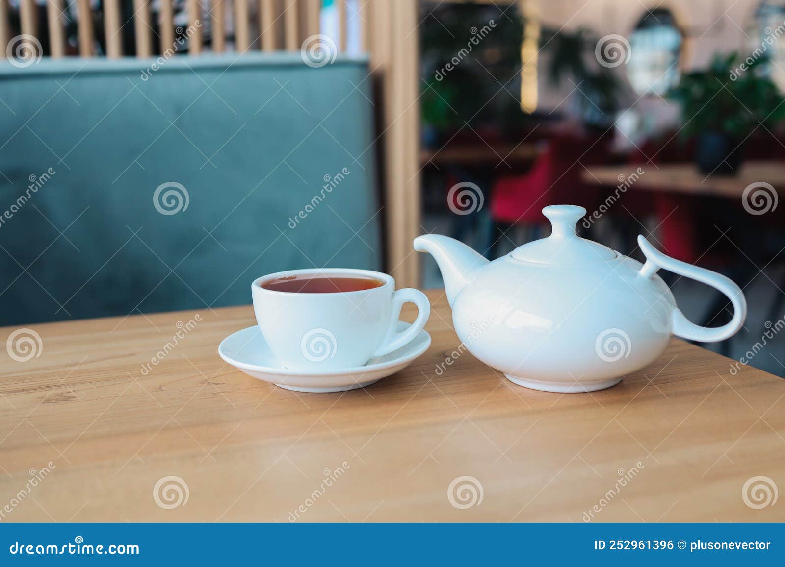 Tea in a Cup with a Teapot on a Table in a Restaurant Stock Photo ...