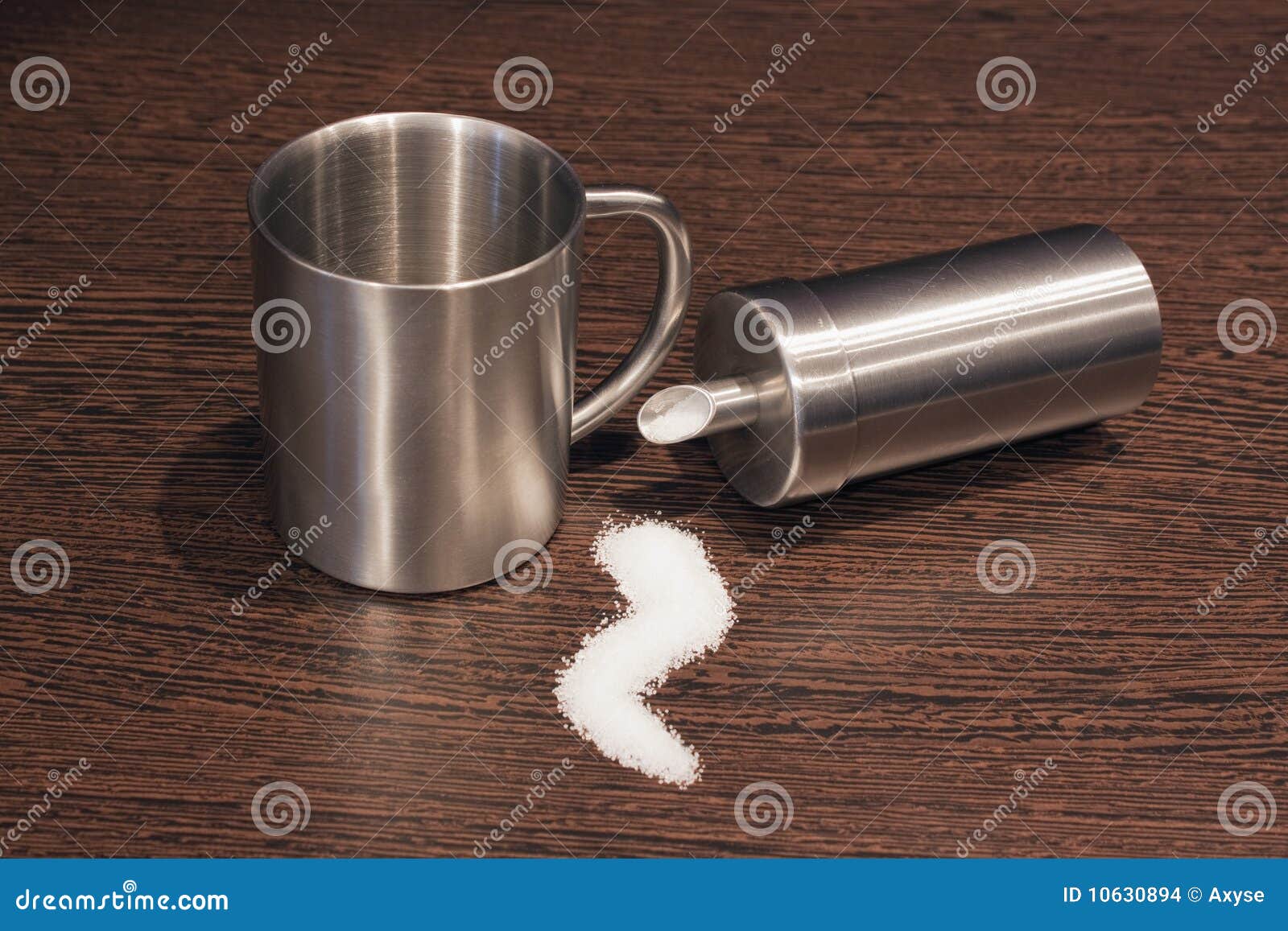 Tea Cup and Tipped Over Sugar Dispenser Stock Photo - Image of clear ...