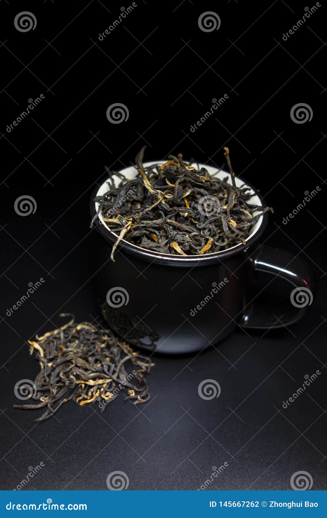 Tea in Black Background stock photo. Image of herbs - 145667262