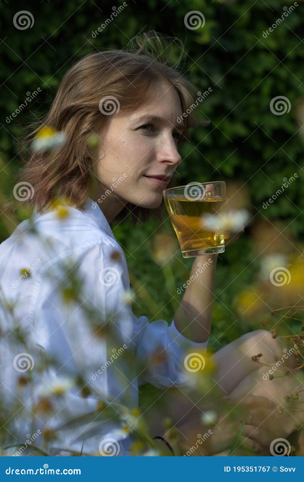 Tea drinking in nature. stock image. Image of bright - 195351767