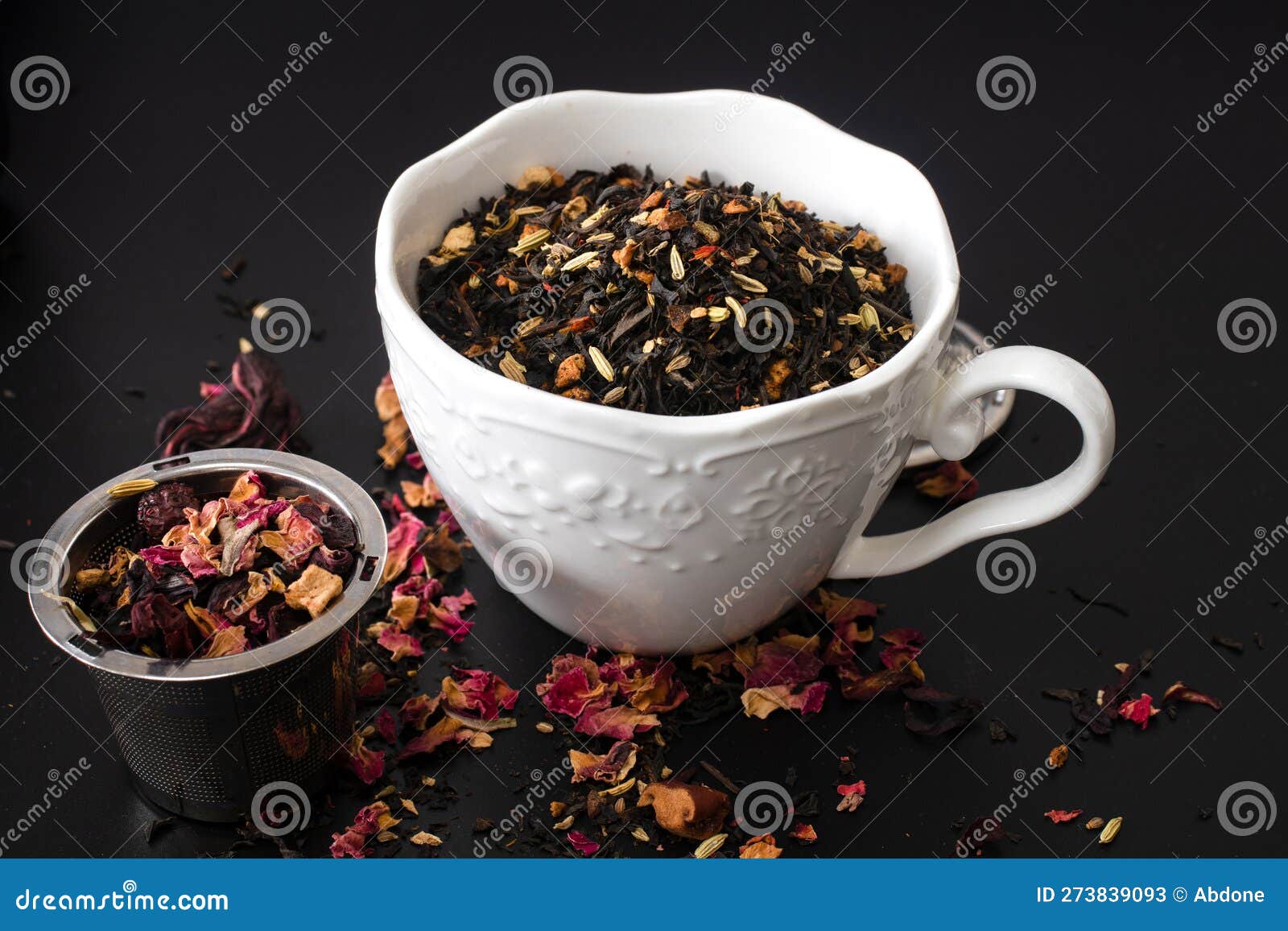 Tea Infuser and Dries Tea Leaves Stock Image - Image of product ...
