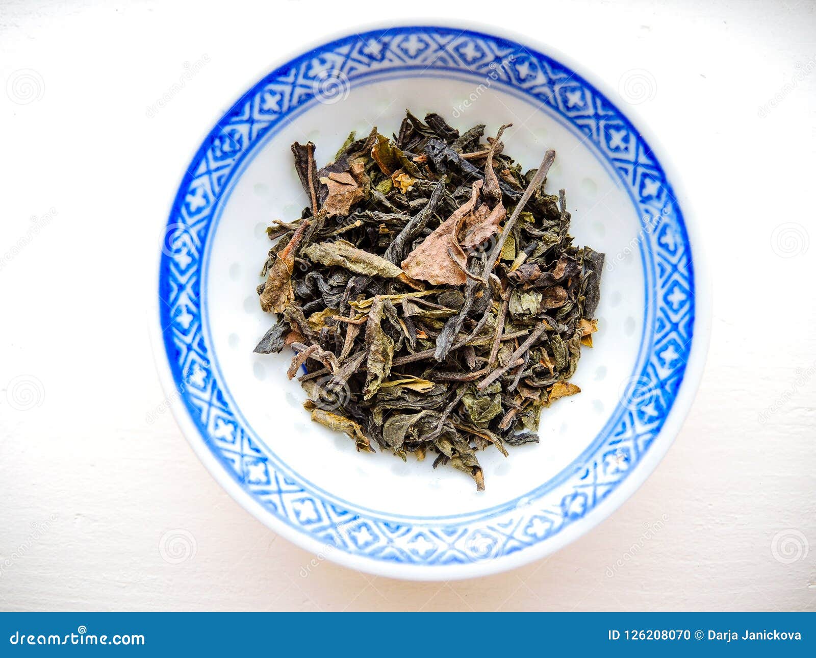 Tea leaves on plate stock photo. Image of leaves, hill - 126208070