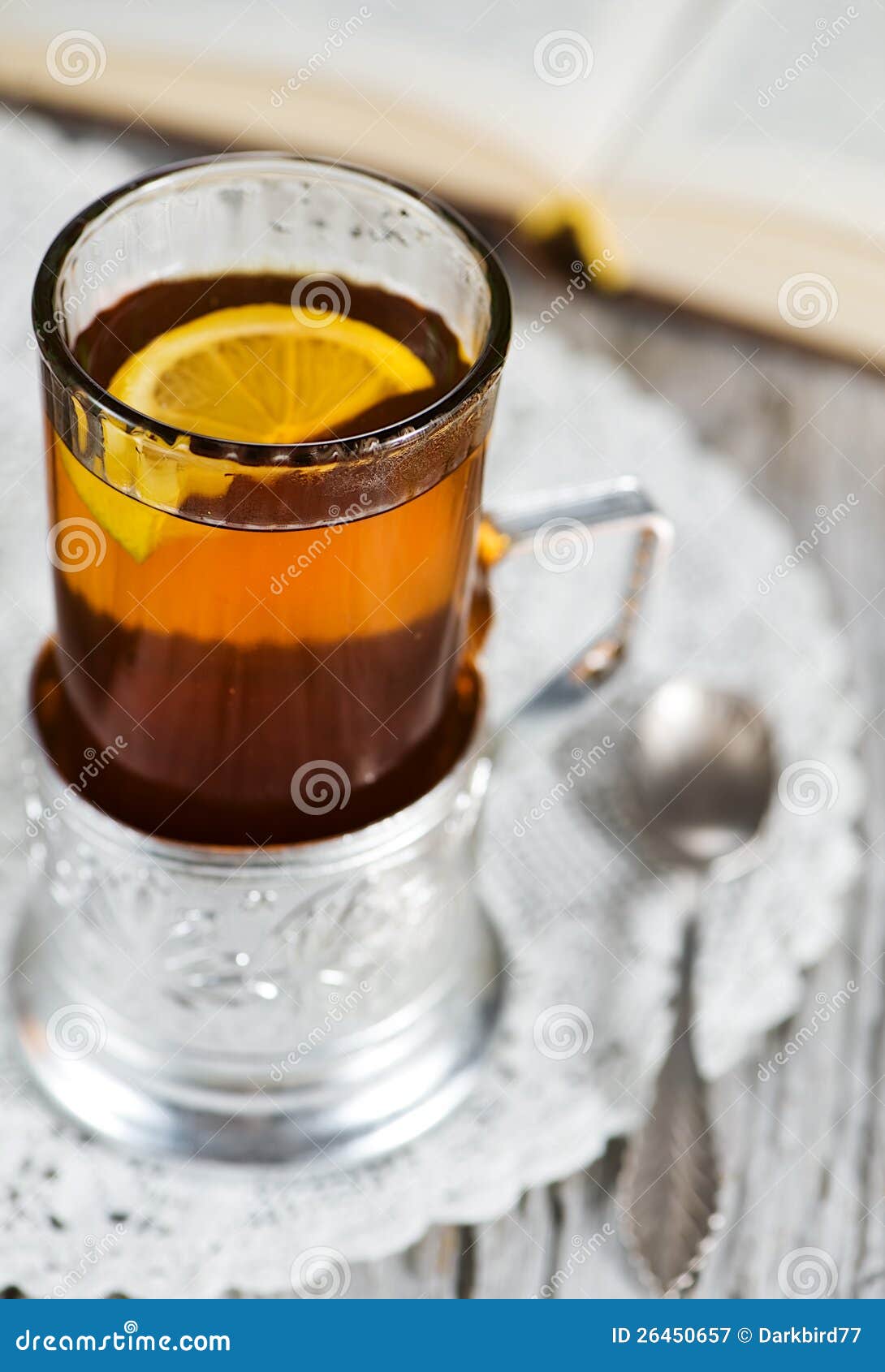 Tea with Lemon in the Glass-holder and Book Stock Image - Image of iron ...