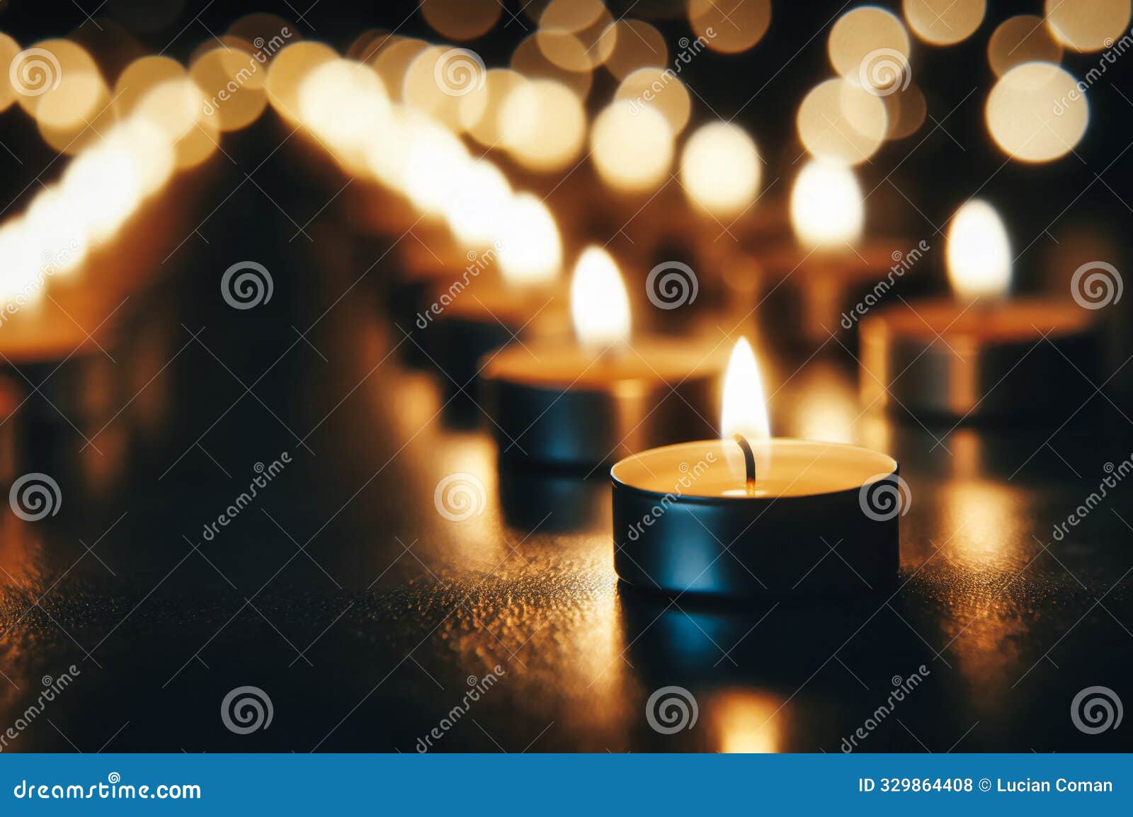 Tea Light Candles on a Reflective Surface. Focus on First Candle with a ...