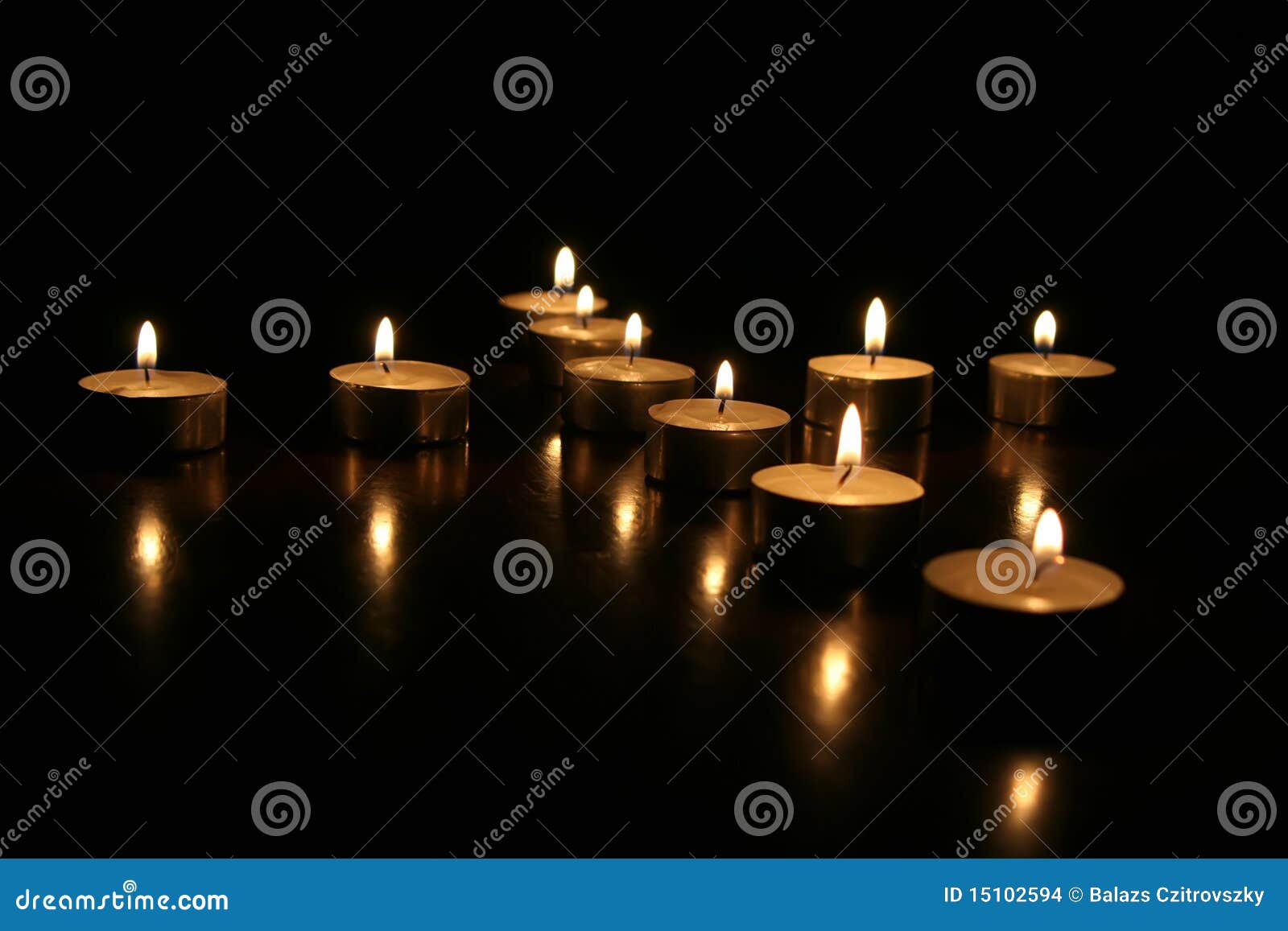 Tea Lights on Black Background Stock Photo - Image of shape, cross ...