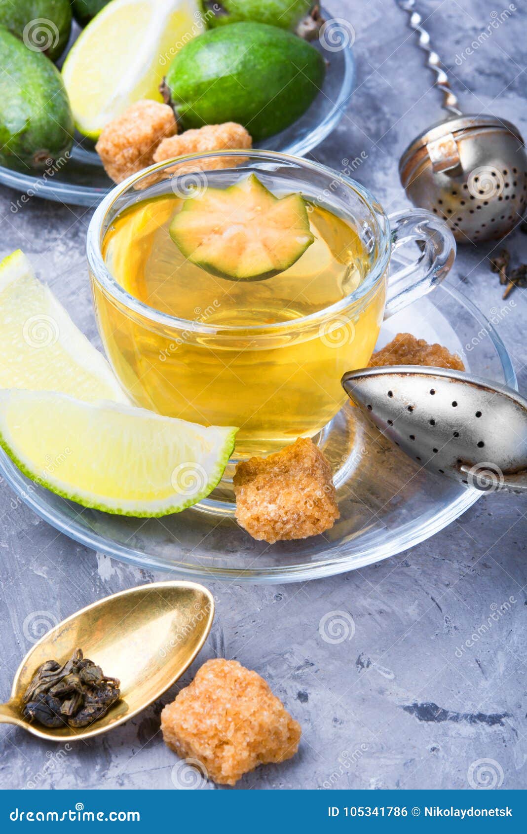 Tea with lime and feijoa stock photo. Image of green - 105341786