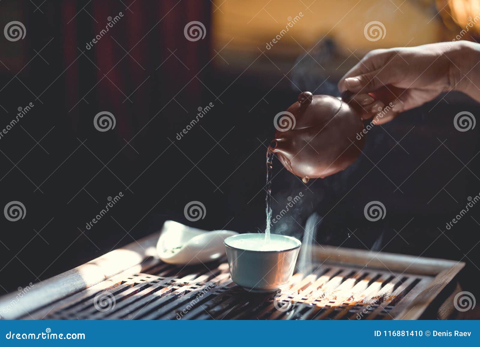 Tea Master Pouring Tea in Sunlight Stock Photo - Image of people ...
