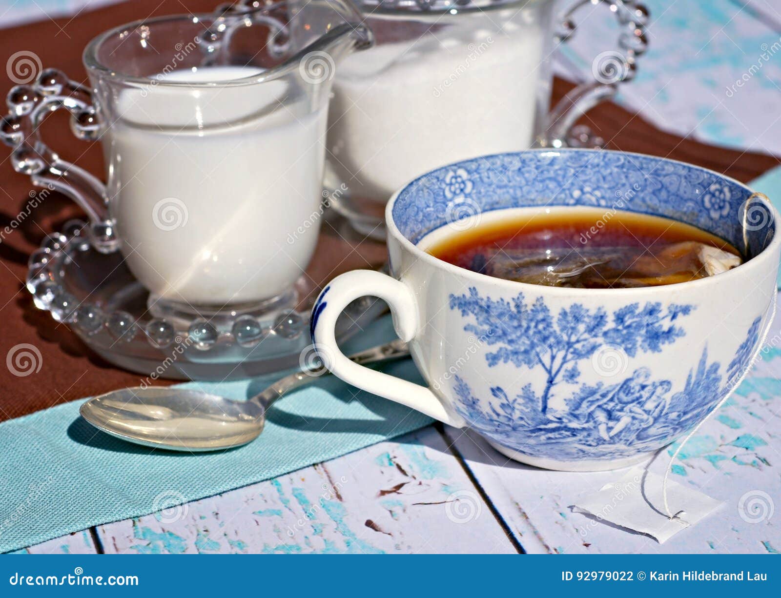 Tea with milk and sugar stock photo. Image of cream, silver - 92979022