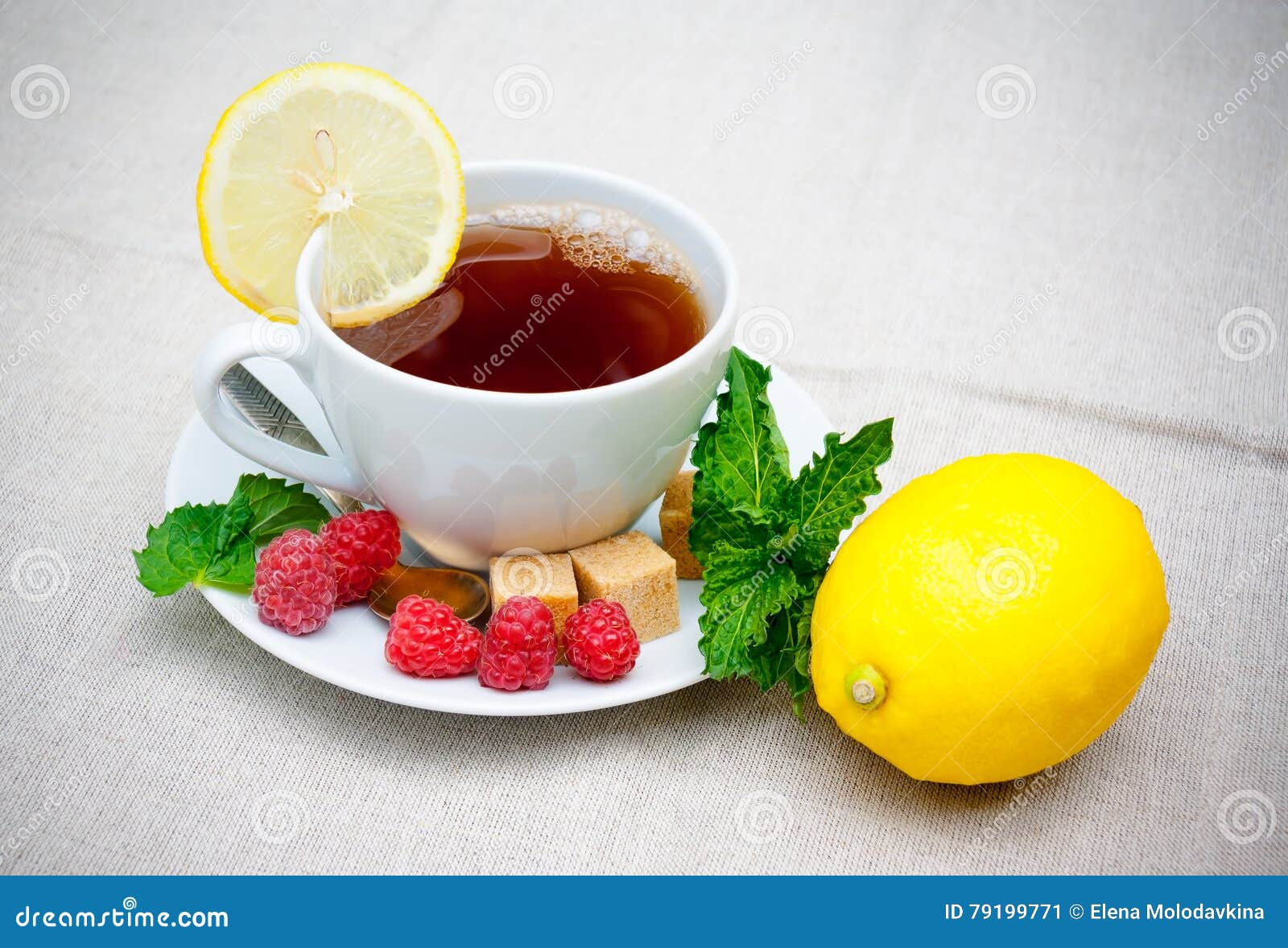 Tea with Mint, Brown Sugar, Raspberry and Lemon on Table Stock Image ...