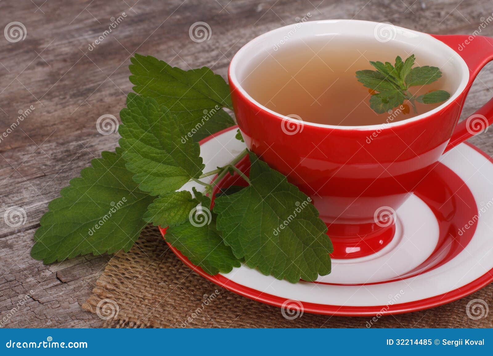 Tea with Mint in a Red Cup on Old Wooden Stock Image - Image of ...