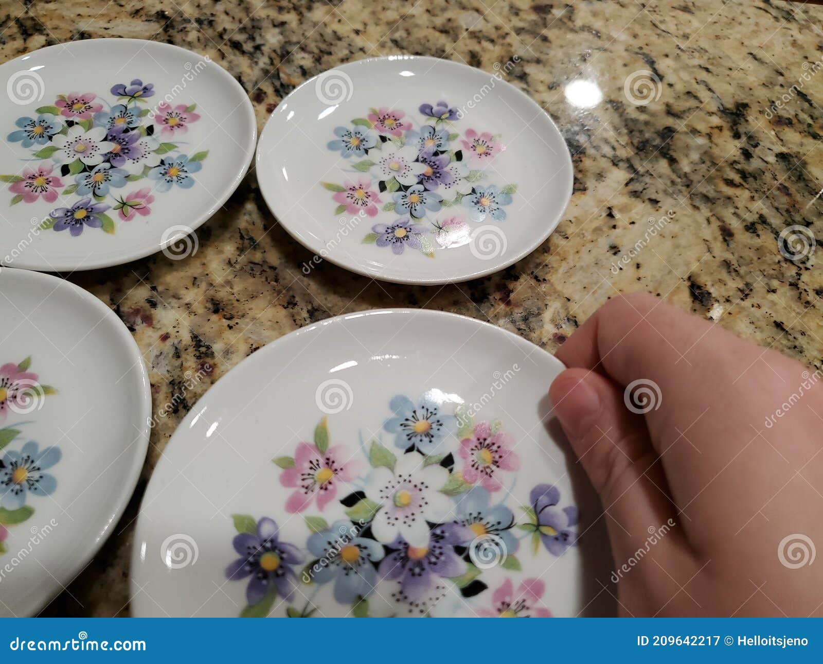 Tea plates with flowers stock image. Image of tableware - 209642217