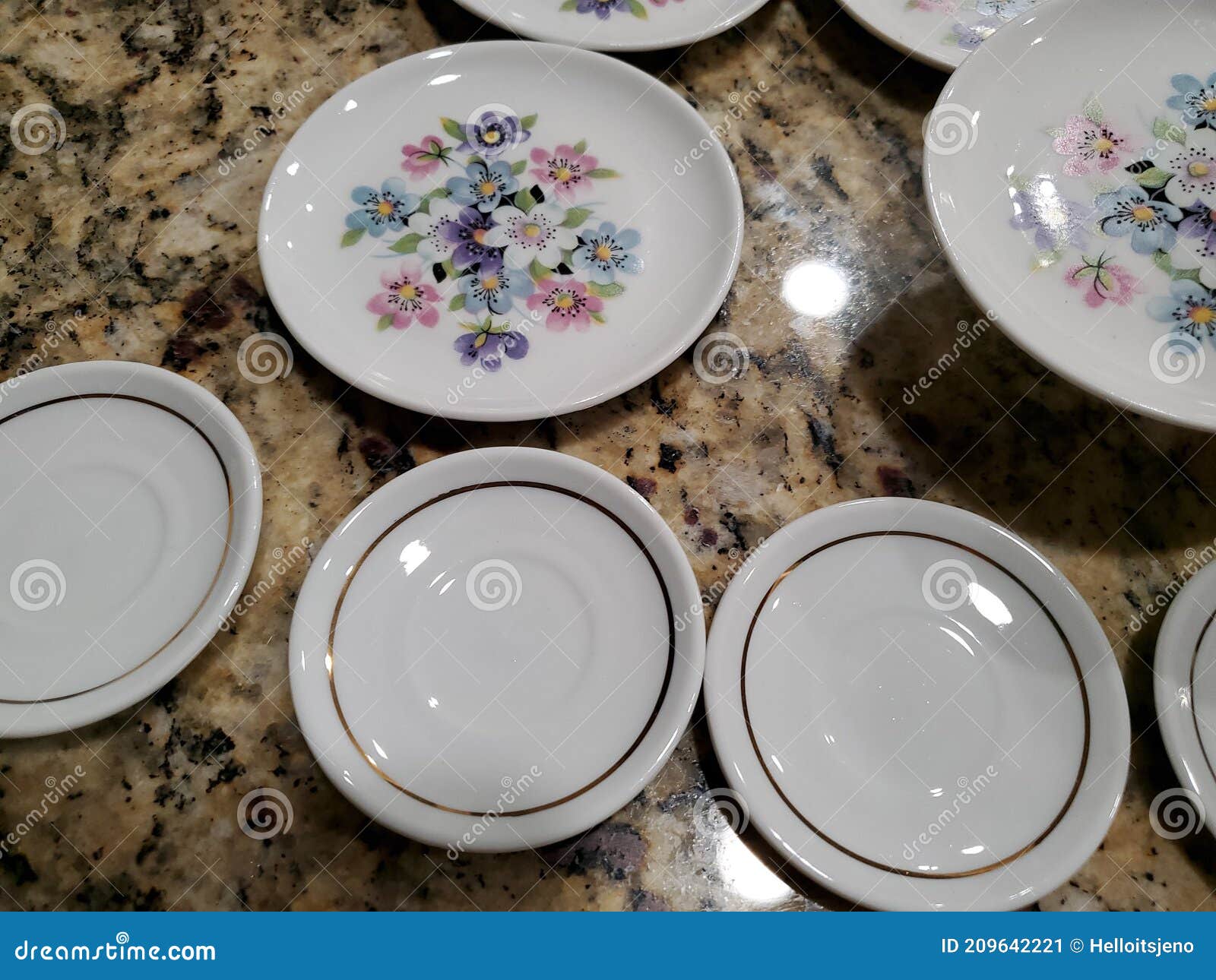 Tea plates with flowers stock image. Image of dessert - 209642221