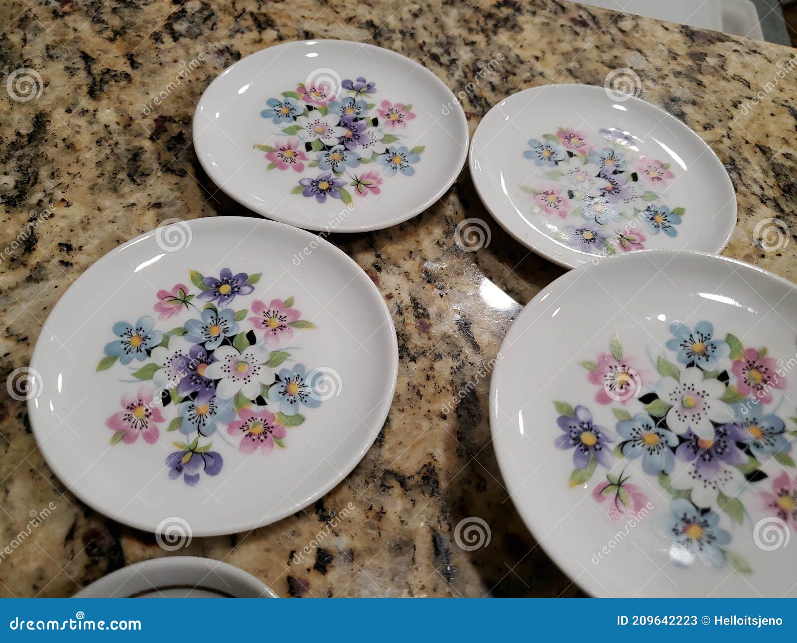 Tea plates with flowers stock image. Image of porcelain - 209642223