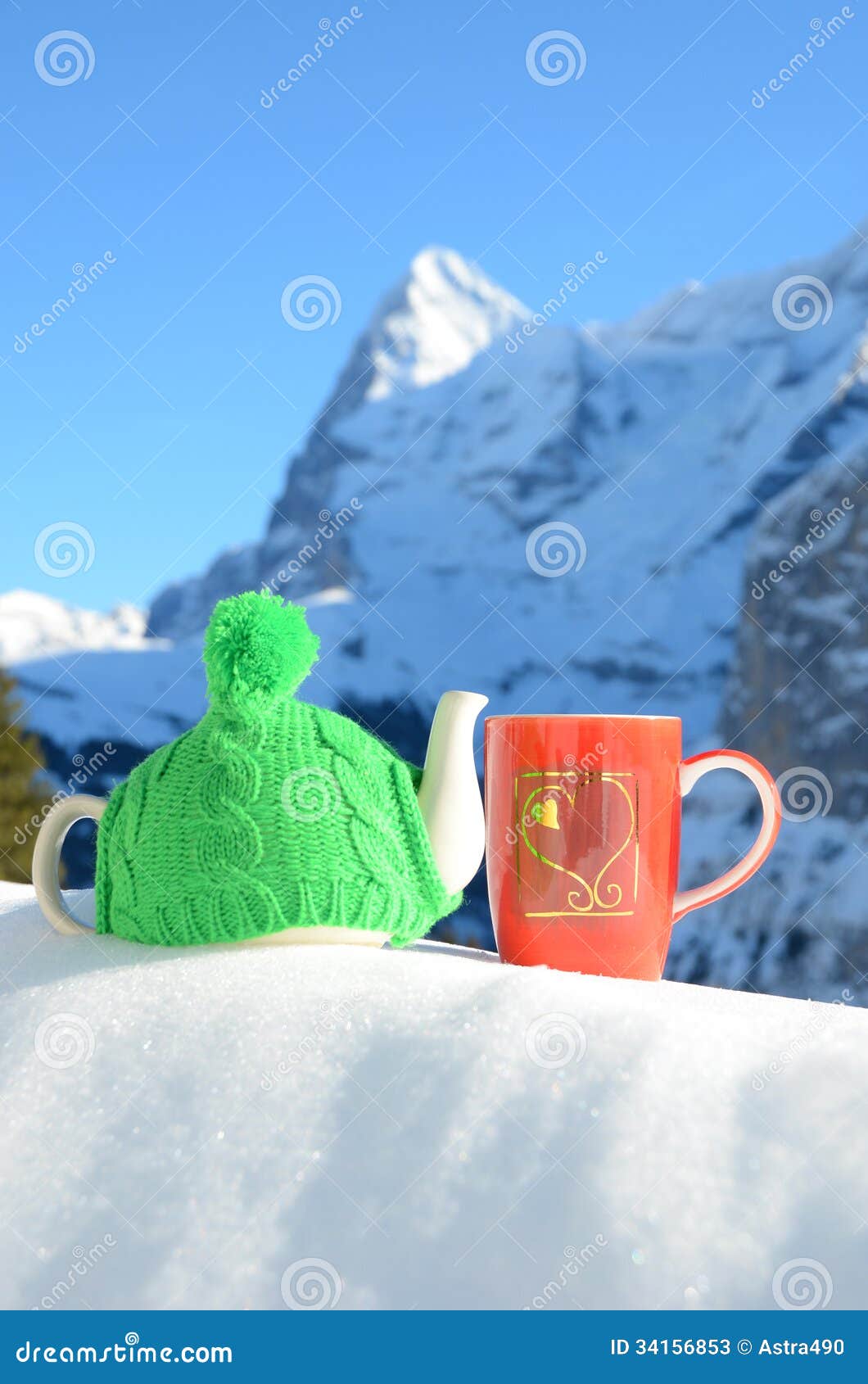 Tea Pot in the Cap and a Cup Stock Image - Image of headwear, cosy ...
