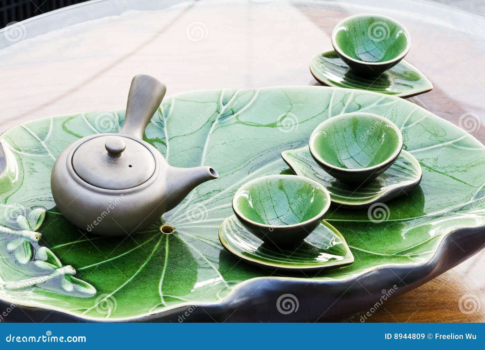 Tea pot and cups stock image. Image of liquid, green, tasteful - 8944809