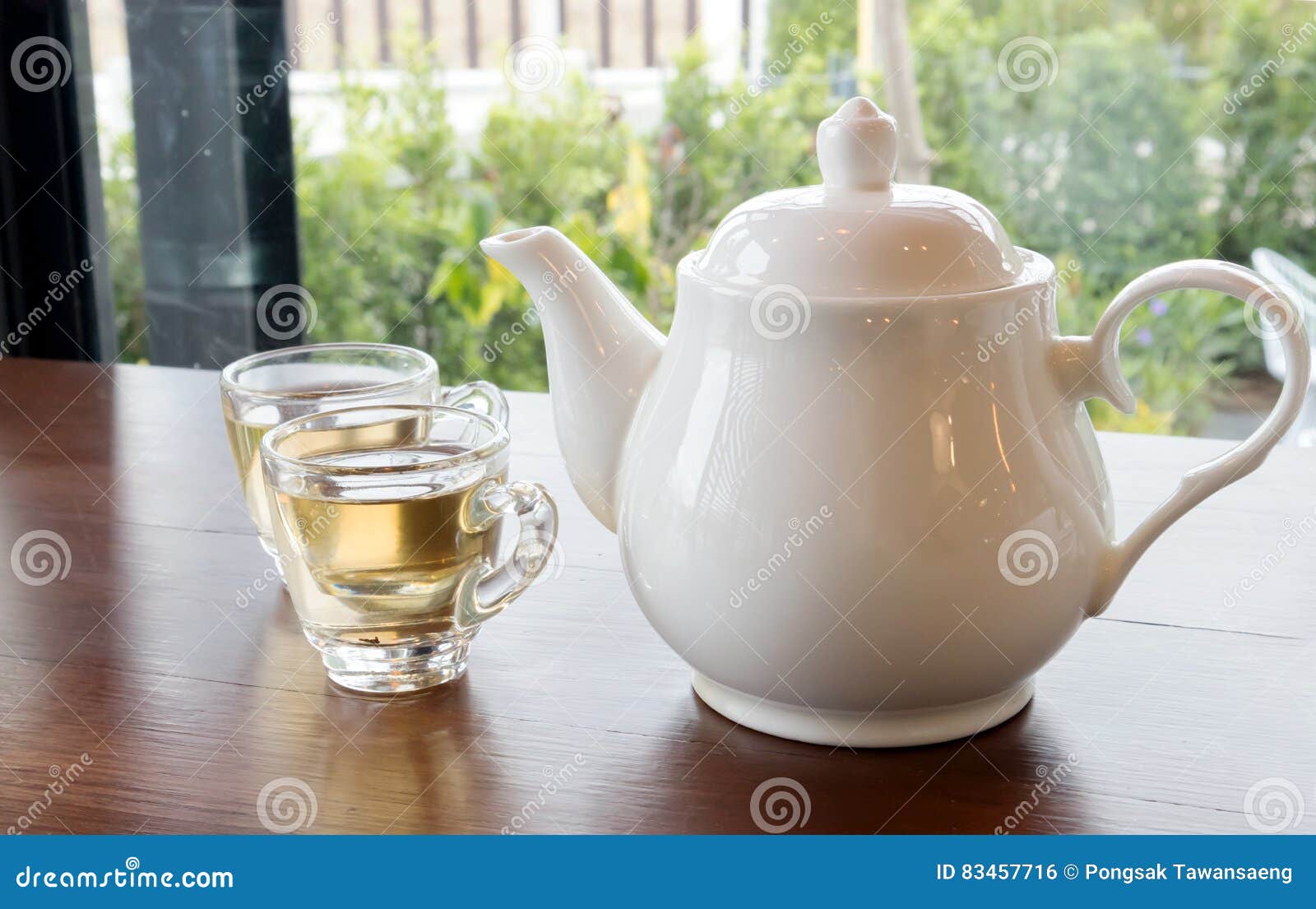 Tea Pot and Cups of Tea on Wood Table Stock Photo - Image of white ...