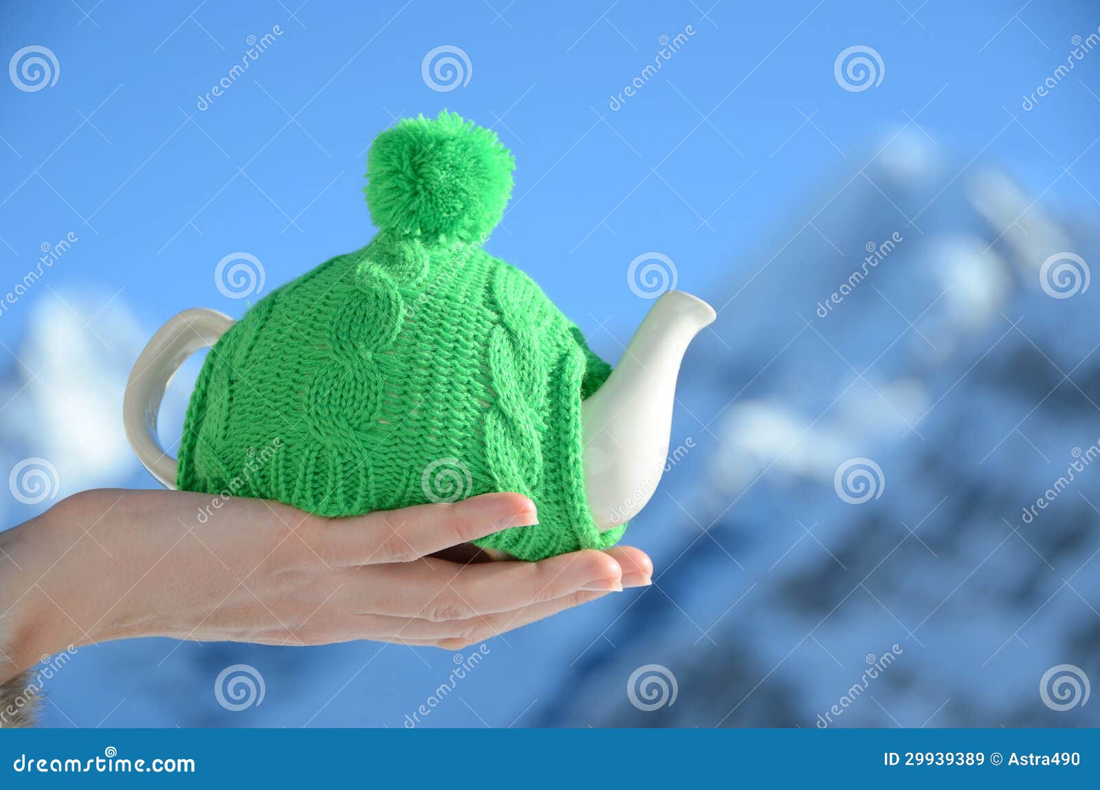 Tea pot in the knotted cap stock image. Image of cosy - 29939389