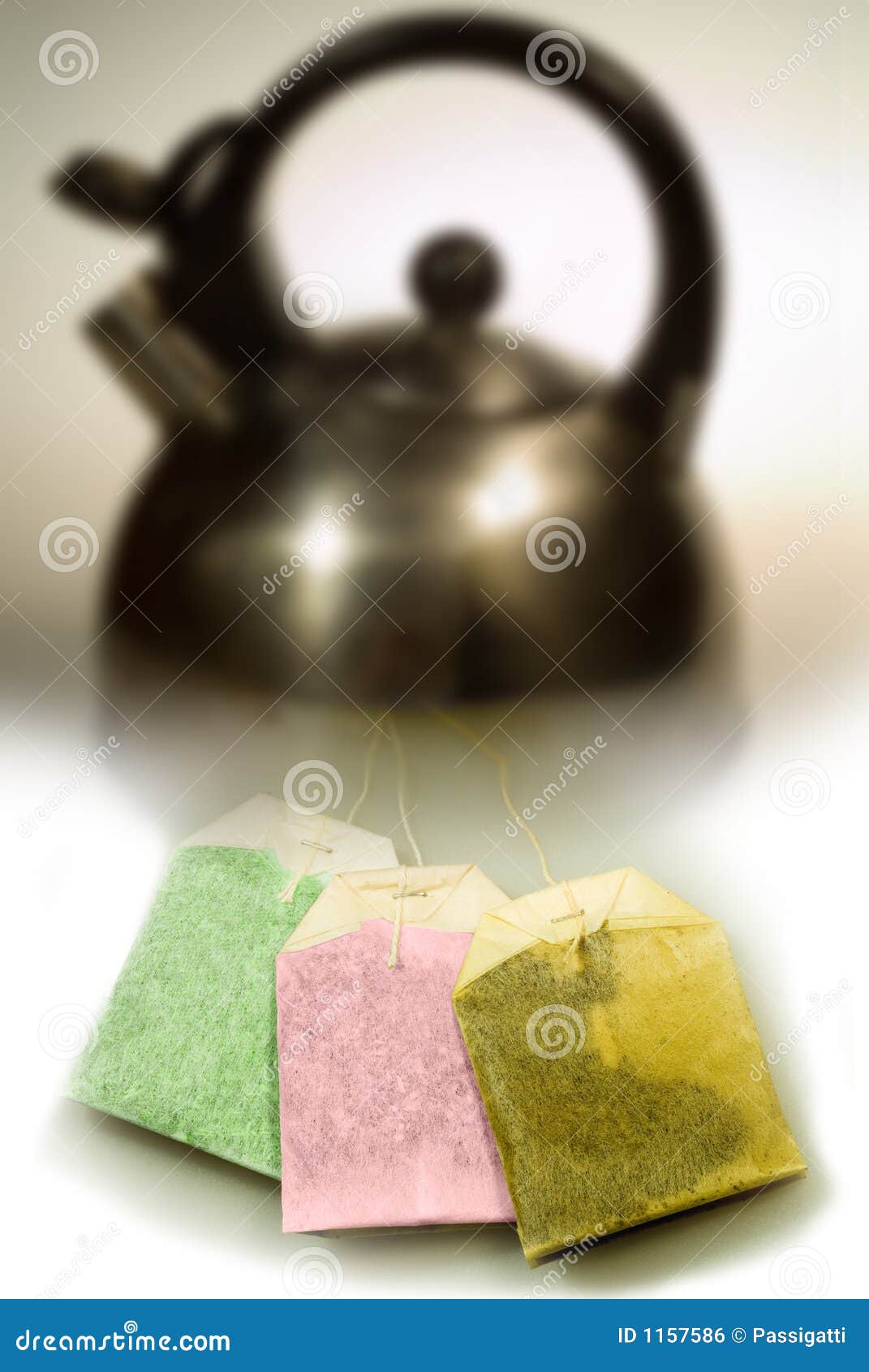 Tea Pot with Tricolor Bags stock photo. Image of teapot - 1157586