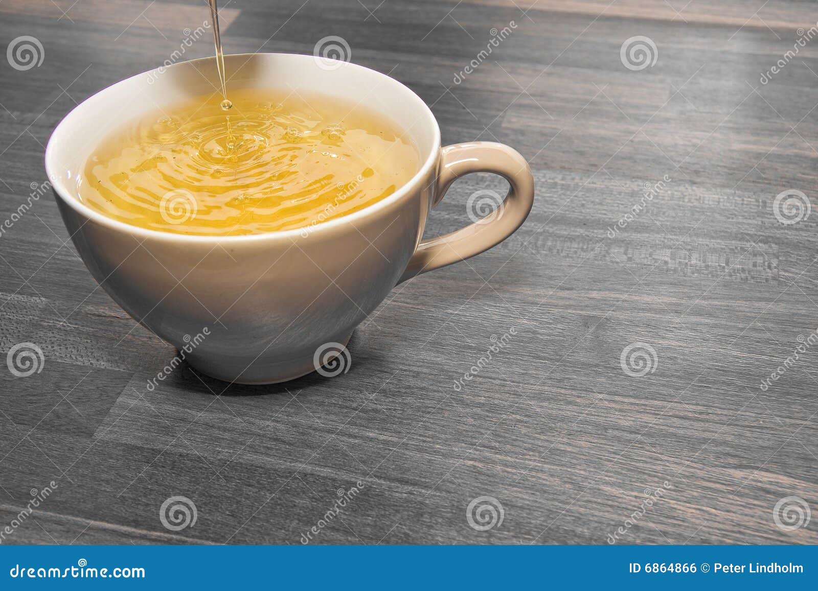 Tea pouring into cup stock photo. Image of refreshment - 6864866