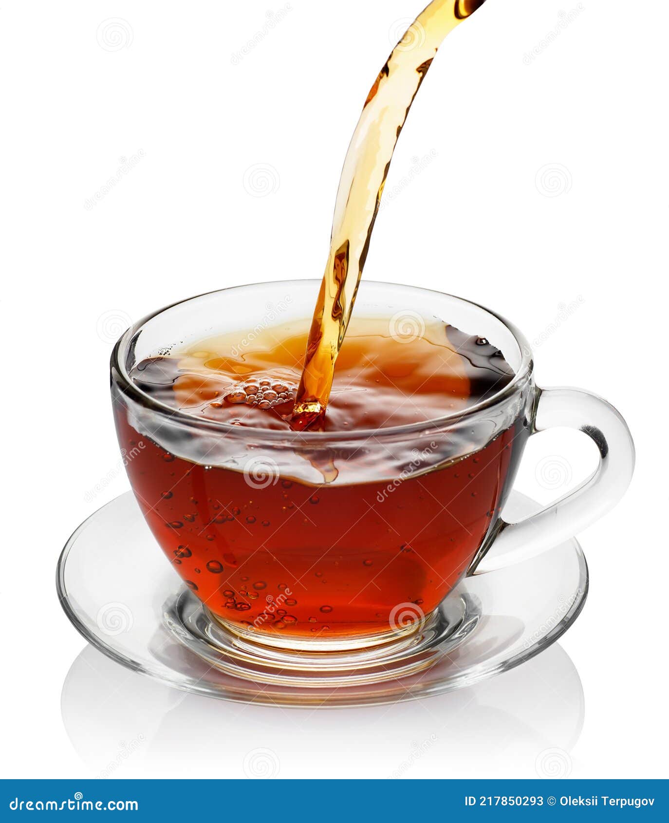 Tea pouring into cup stock image. Image of saucer, black - 217850293