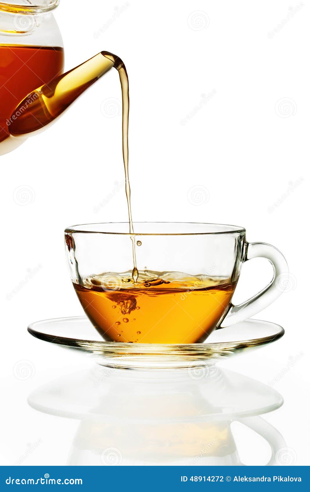 Tea pouring into glass cup stock photo. Image of beverage - 48914272