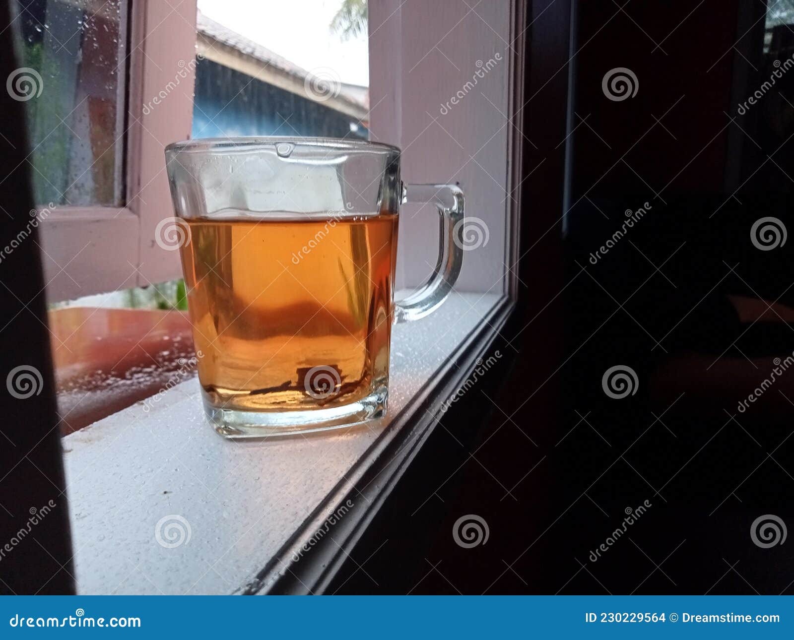Tea and rain stock photo. Image of rain, cold, glas - 230229564