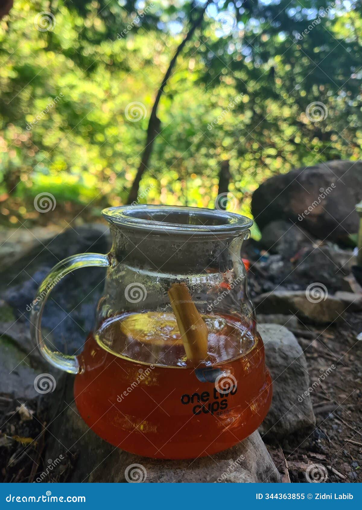 Tea on the river rocks stock image. Image of lighting - 344363855