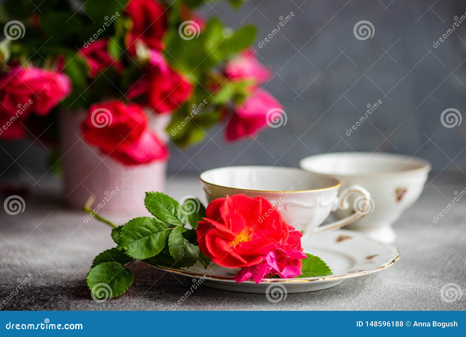 Tea set with red roses stock photo. Image of bouquet - 148596188