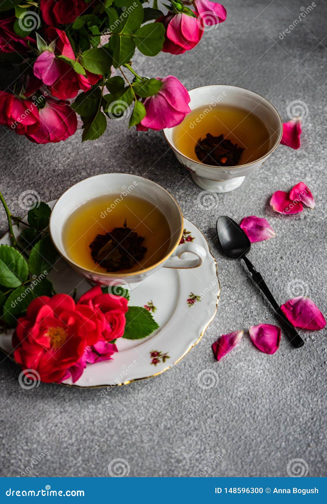 Tea set with red roses stock photo. Image of bond, blossom - 148596300