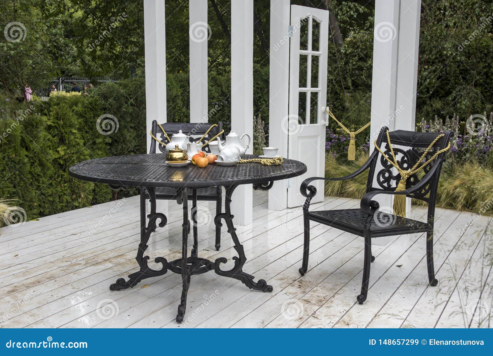 Tea Set on the Table in the Garden. Landscape Design Stock Image ...