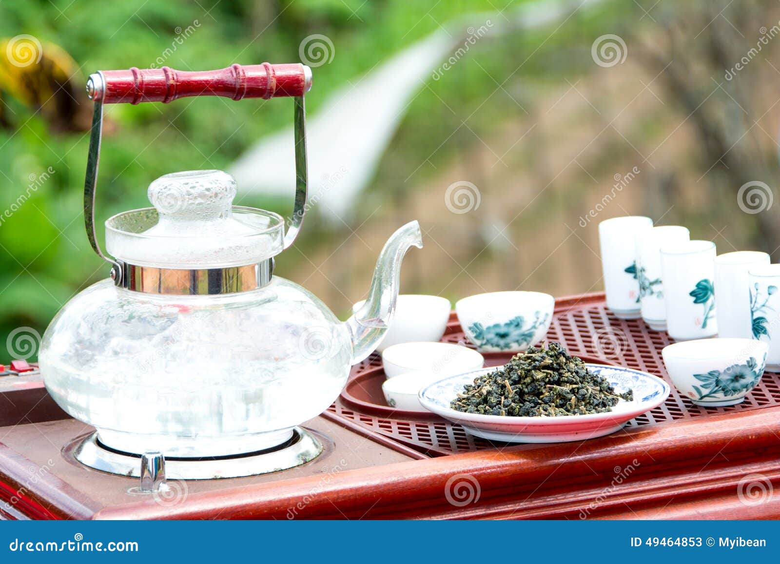 Tea set on a wooden plate stock image. Image of chahe - 49464853