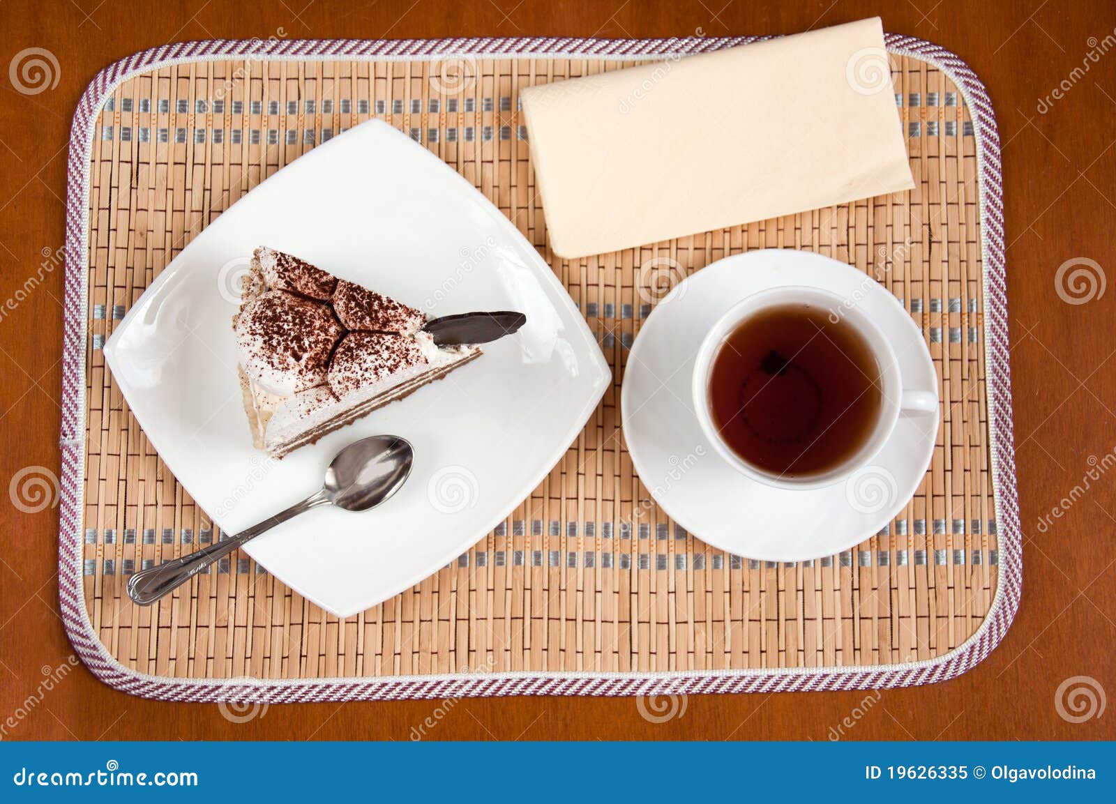 Tea and a slice of cake stock image. Image of spoon, cream - 19626335