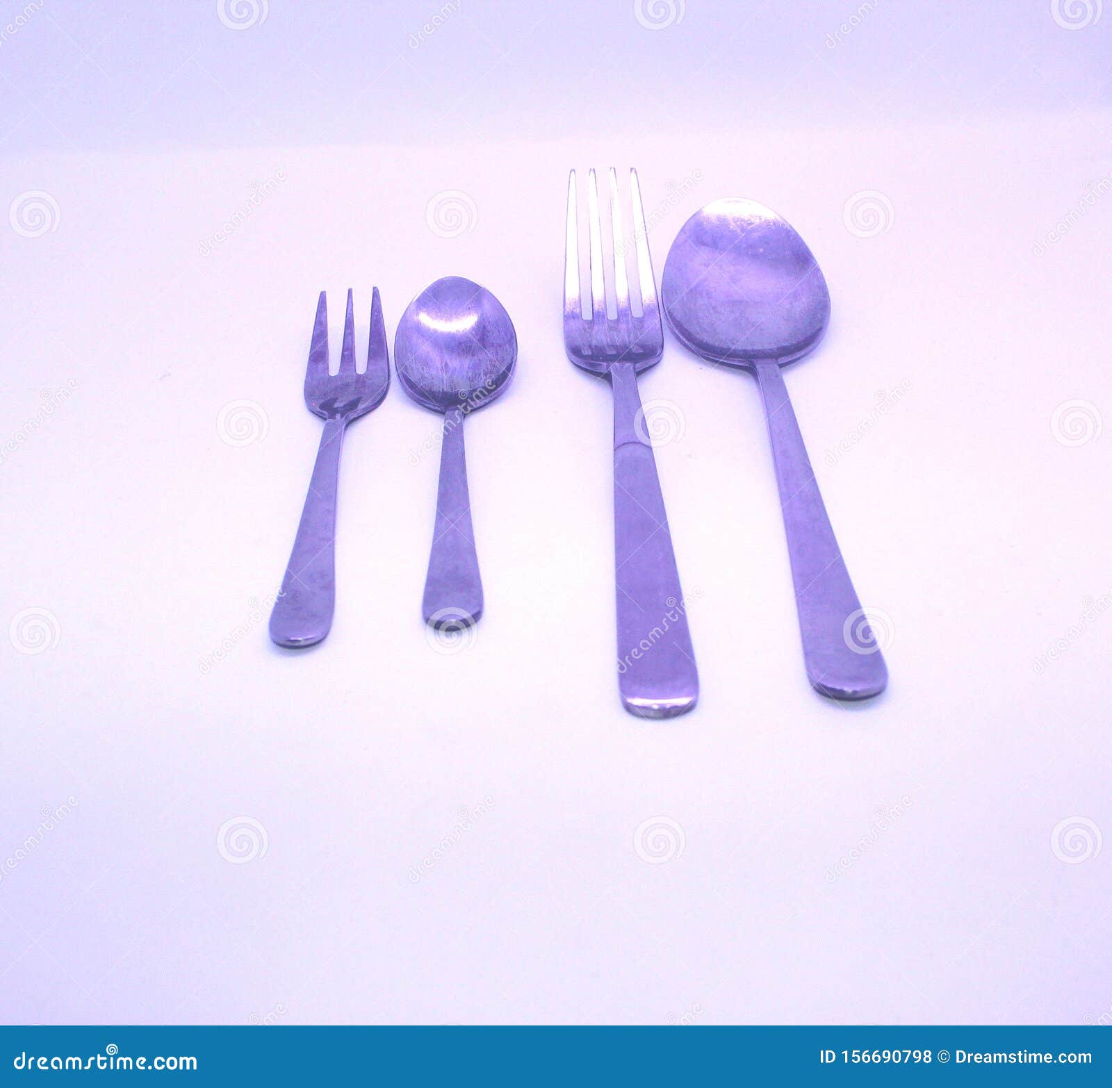 Tea Spoon-fork Vs Dining Spoon-fork Stock Photo - Image of steel, fork ...