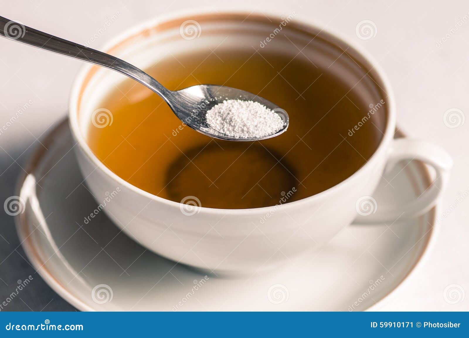 Tea with Sweetener in a Spoon Stock Image - Image of sweetener ...