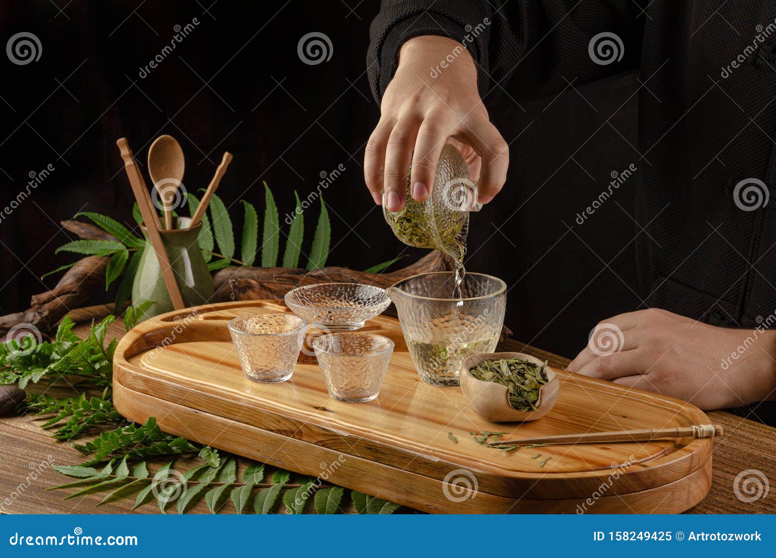 Tea Table with Instruments Teapots Cups and Tea Shen Puer Stock Image ...